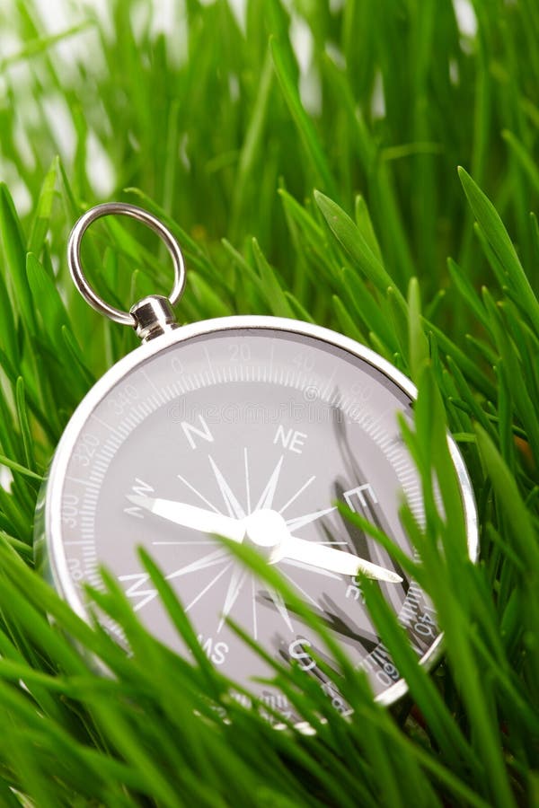 Compass With Green Arrow Leading To A Sustainable Future Stock Photo ...