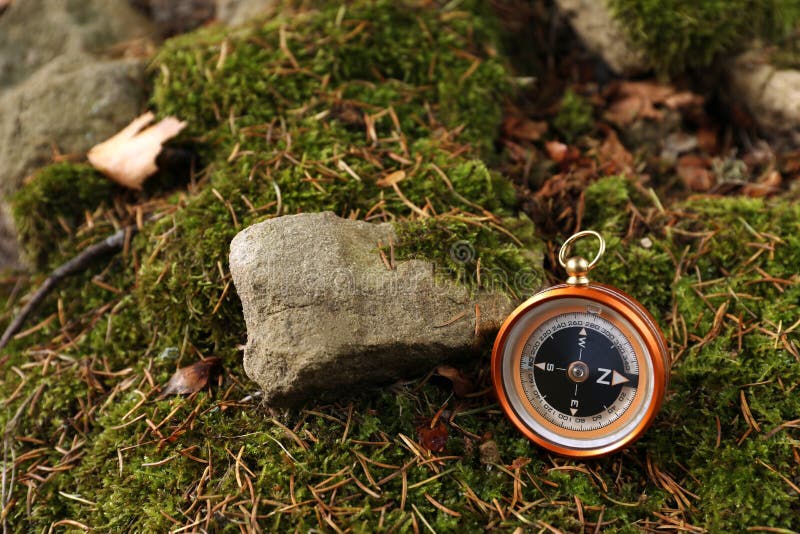 Compass on Ground Outdoors, Space for Text Stock Photo - Image of ...