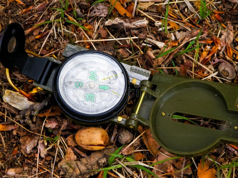 Compass on the Ground. Travel Concept Stock Image - Image of survival ...