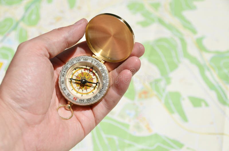 Compass in the hand stock image. Image of magnetic, hand - 41976677