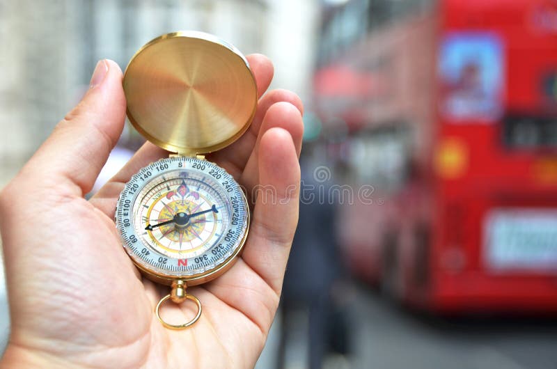 Compass in the hand stock photo. Image of golden, direction - 160137272