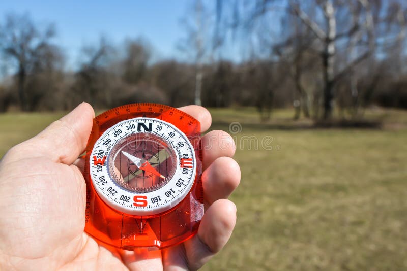 Compass in hand. stock photo. Image of geography, compass - 117577990