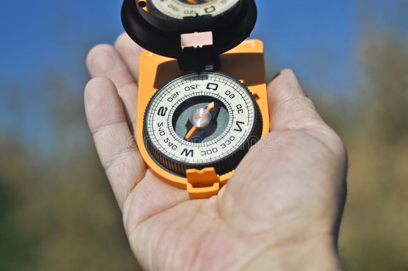 Compass in hand. stock photo. Image of people, forward - 50218950