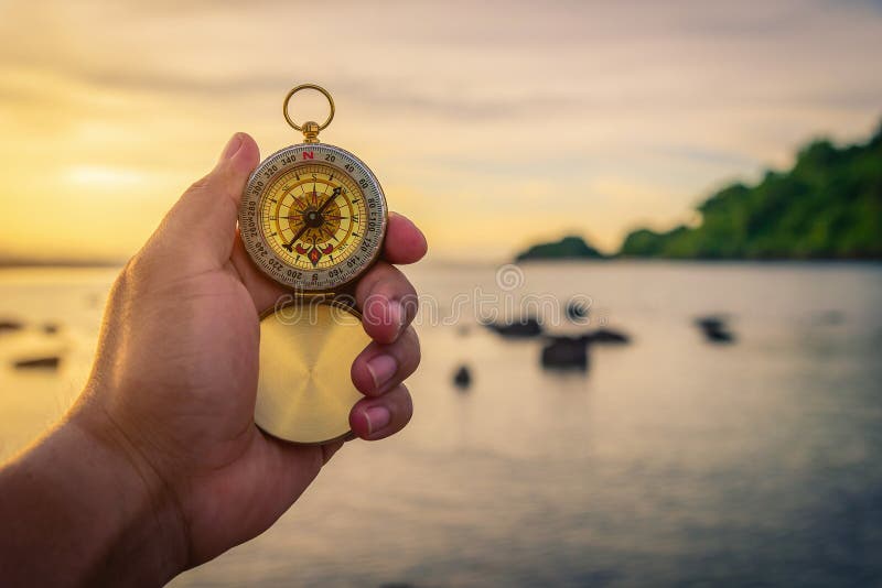 Compass in the Hand on the Nature. Stock Image - Image of lost, leader ...