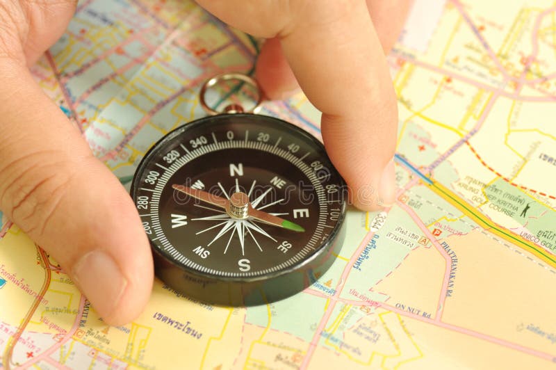 Compass in Hand Navigating on Map Pape Stock Image - Image of abstract ...