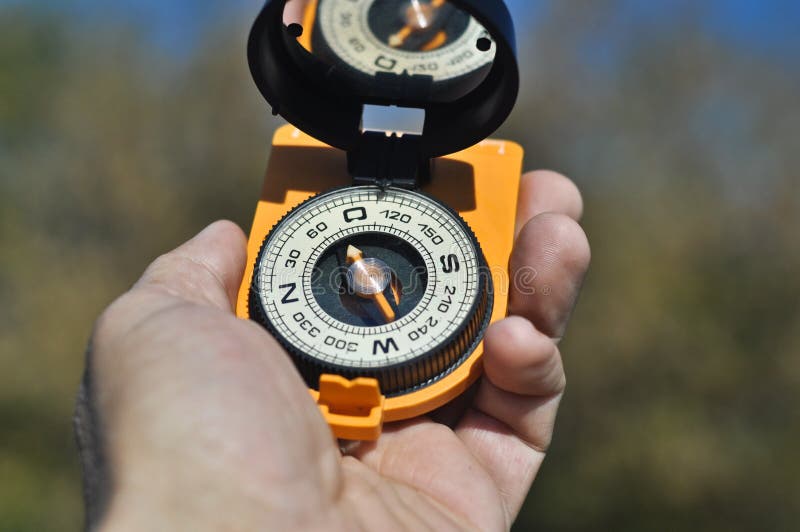 Compass in hand. stock image. Image of orienteering, object - 47433075