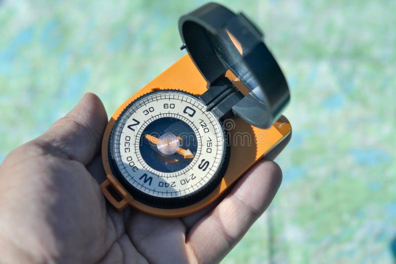 Compass in hand. stock photo. Image of lost, hand, astray - 47433084