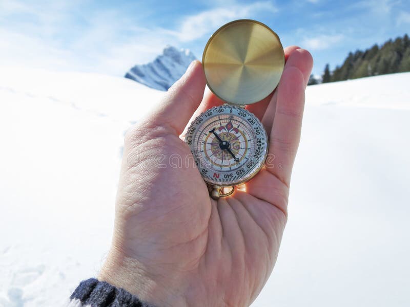 Compass in the hand stock image. Image of explore, mountains - 51120163