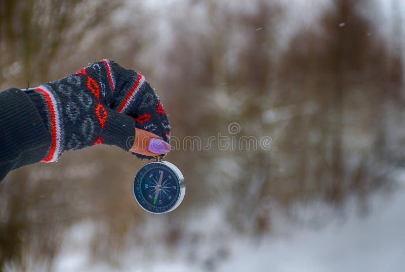 The Compass in the Hands during the Winter Travel Stock Image - Image ...