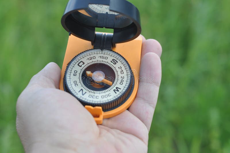 The compass in his hand. stock image. Image of journey - 42291811