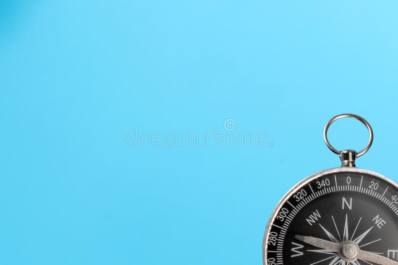 Compass Isolated on a Blue Background. Direction Concept Stock Image ...
