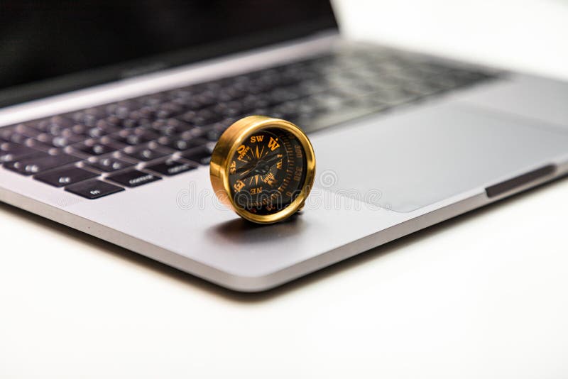 Compass and Laptop As a Symbol of Orientation and Goals on the I Stock ...