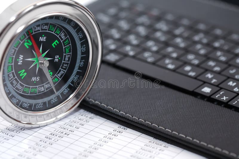 Compass and Laptop stock photo. Image of profit, communication - 72652282
