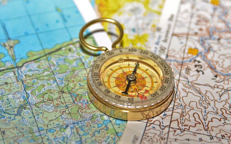 Compass And A Map. - Free Photo from StockFreeImages