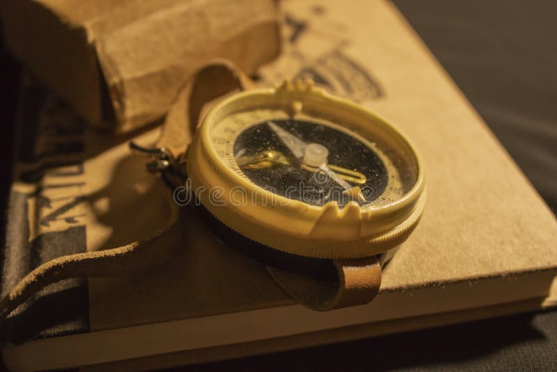 Compass and book stock image. Image of paper, leather - 245580803