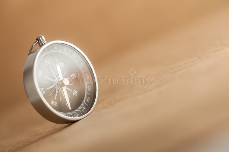Compass on Brown Wooden Background. Stock Image - Image of background ...