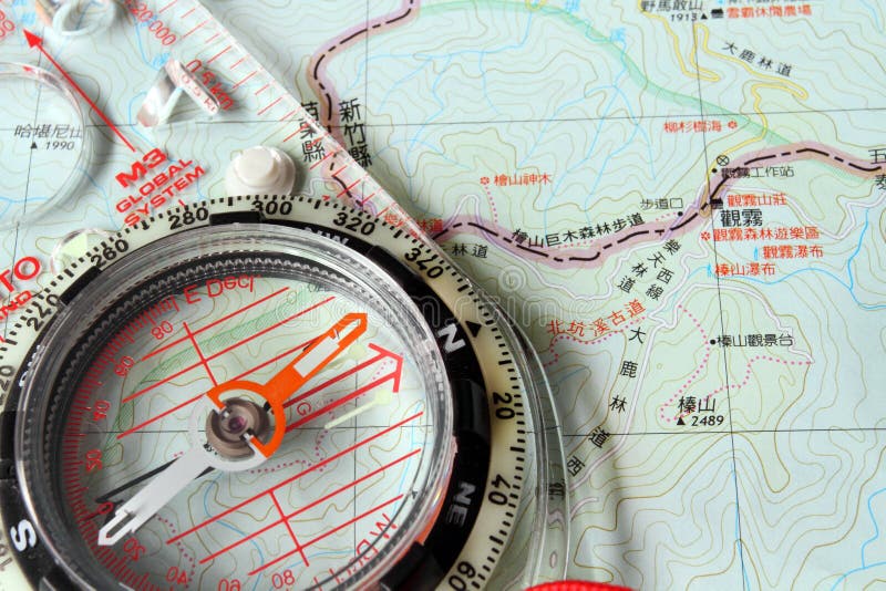 Compass on a local map stock image. Image of orientation - 21140665