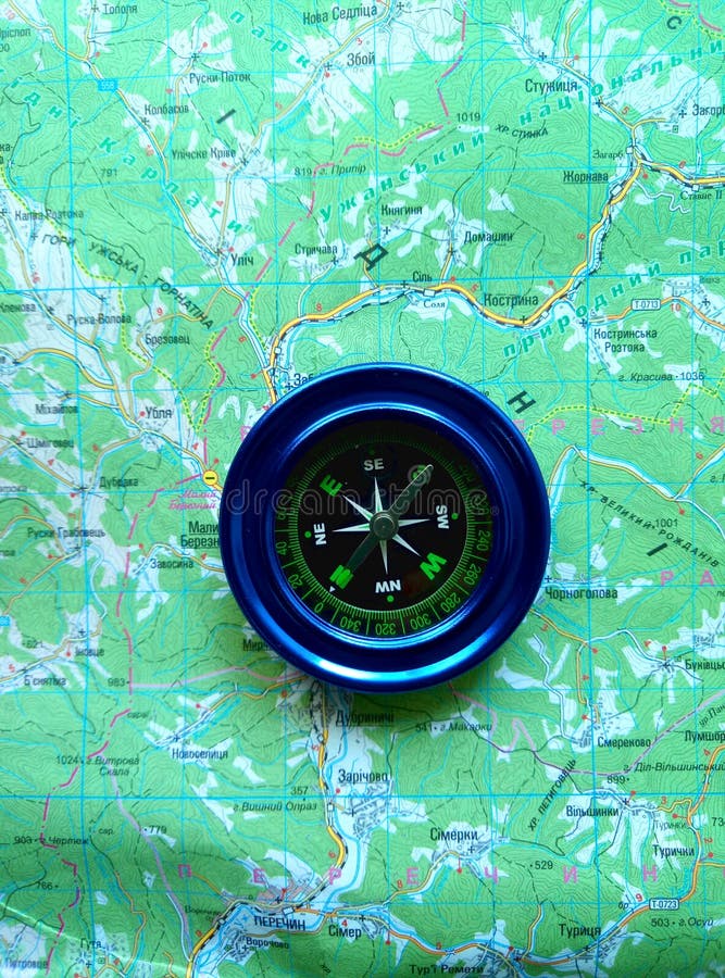 Magnetic Compass Blue on the Road Map. Stock Image - Image of measured ...