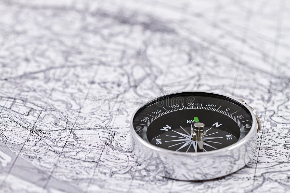 Compass lying on map stock image. Image of cartography - 52431925
