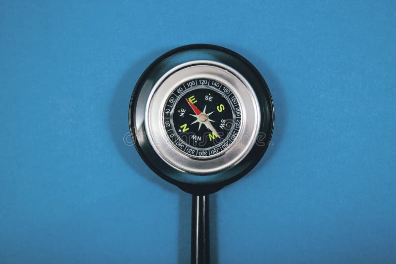 Compass and Magnifier on a Blue Background. Concept Search for ...