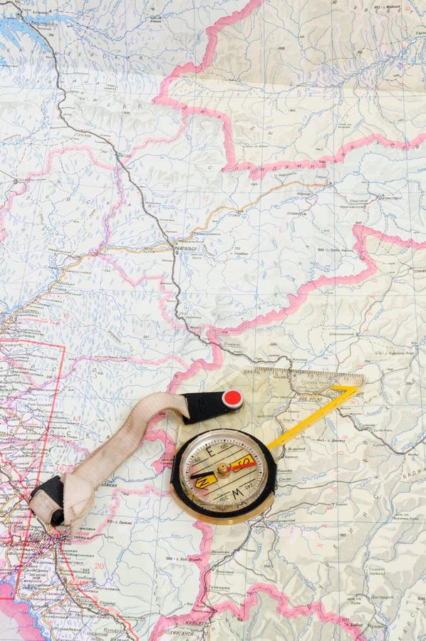 Compass and Map stock photo. Image of chart, hike, hand - 17524924