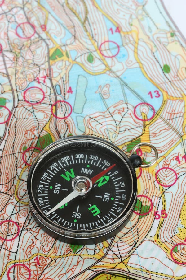 Compass on a map. stock photo. Image of cartography, explore - 22310922