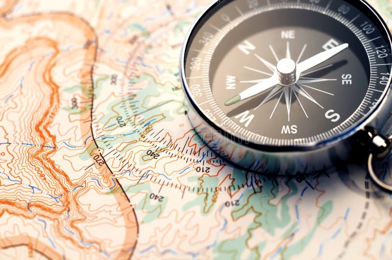 Compass on map stock photo. Image of hiking, hand, canyon - 4866800