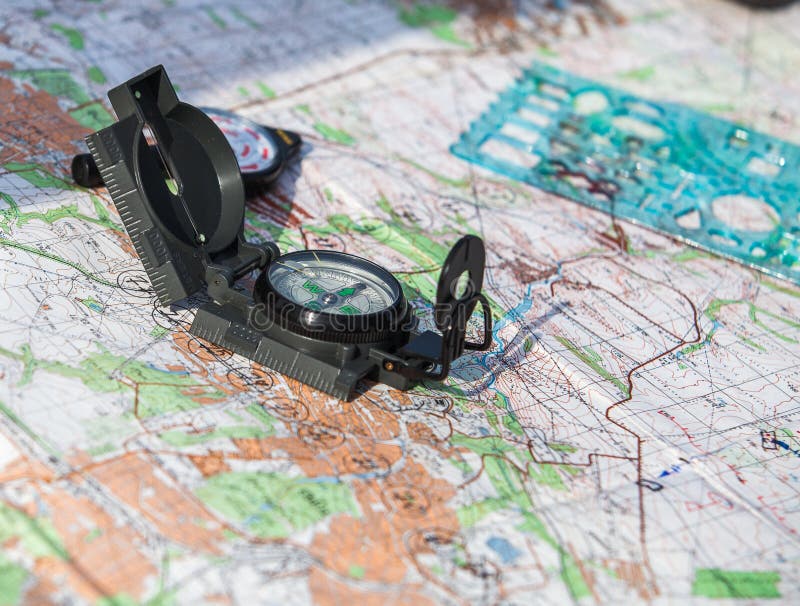 Compass on a Map of the Area Stock Photo - Image of equipment, outdoor ...
