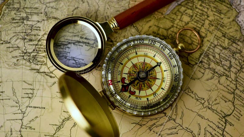 Compass on the map stock footage. Video of bygone, charred - 92178764