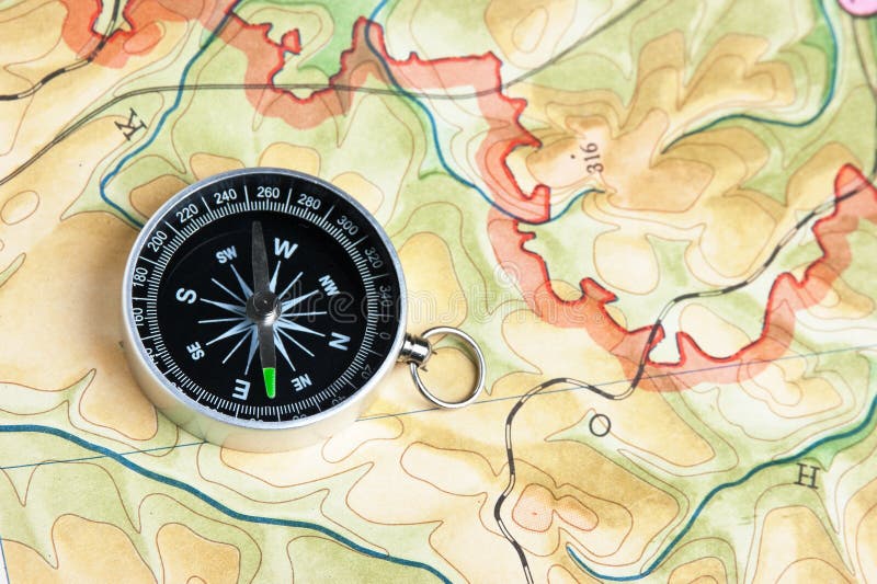 Compass on a map stock image. Image of guidance, sign - 159168145