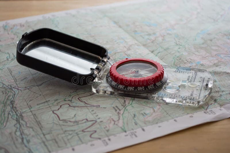 Compass and map on desk stock image. Image of navigation - 310027611