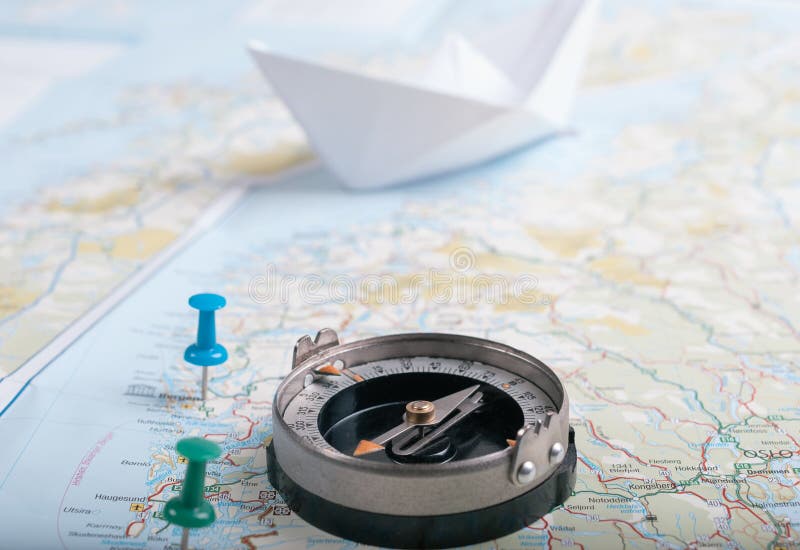 Compass on a Map with a Marked Route Stock Photo - Image of magnetic ...