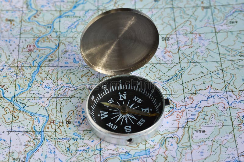 Compass on the map. stock image. Image of exploration - 61468911