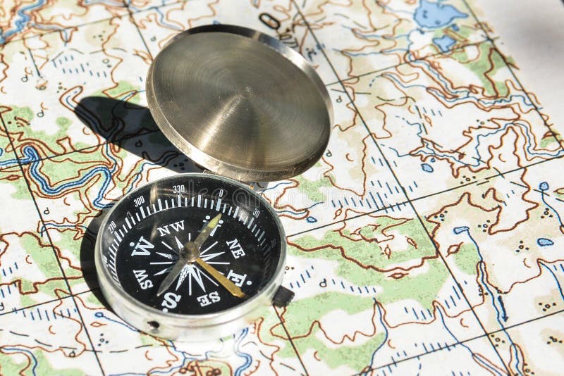 Compass and map stock photo. Image of adventure, outdoors - 187661720