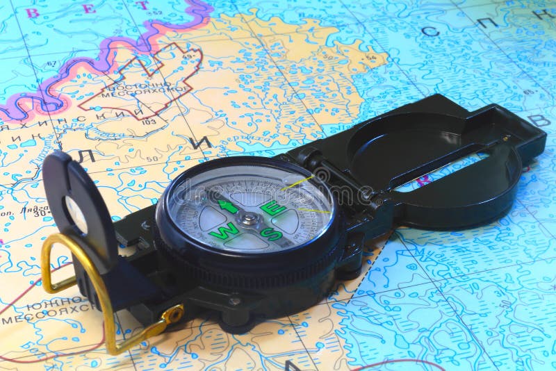 A Compass and a Map of the North of Russia Stock Photo - Image of ...