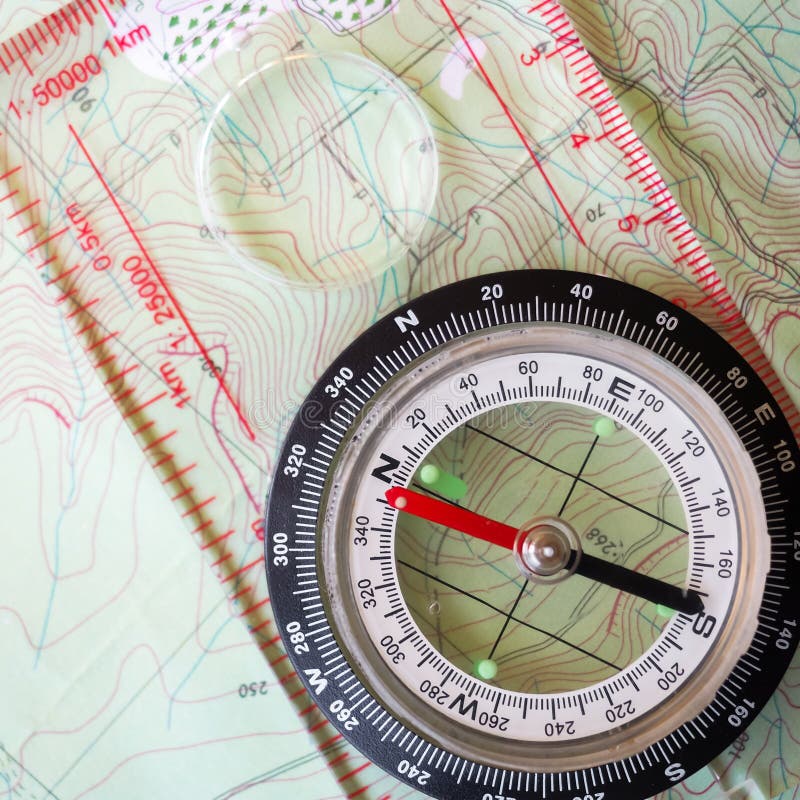 Compass and Map 1 stock image. Image of compass, south - 65382605