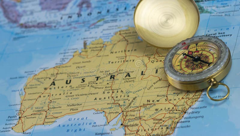 Compass on a Close Up Map Pointing at Indonesia and Planning a Travel ... Compass on a Close Up Map Pointing at Indonesia and Planning a Travel ...