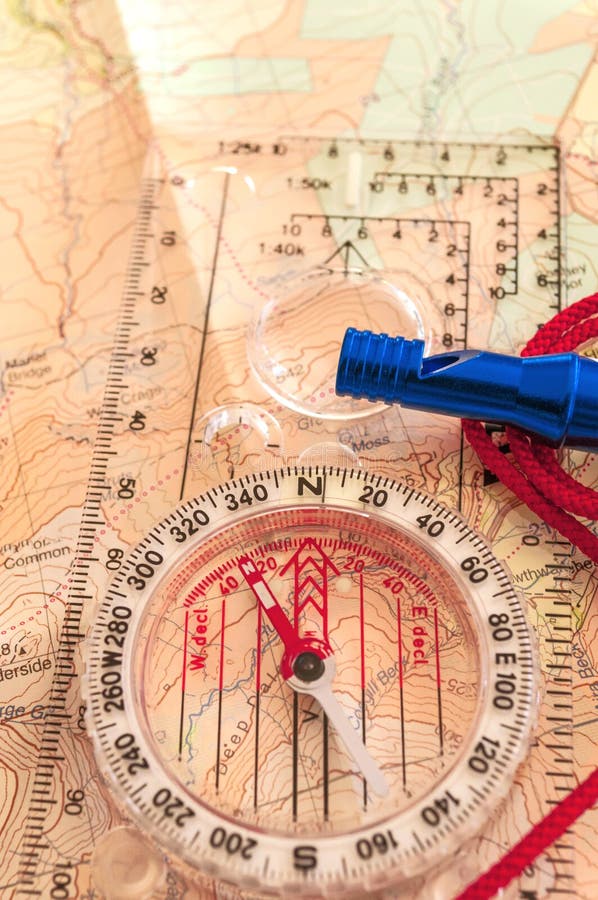 Compass on Map and Rescue Whistle Stock Photo - Image of hiking, south ...