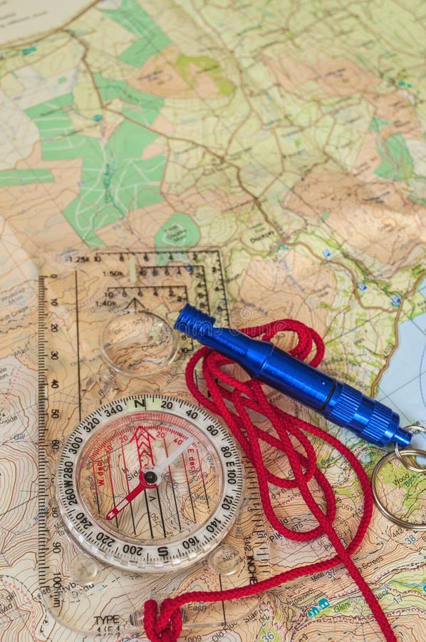 Compass on Map and Rescue Whistle Stock Image - Image of journey ...