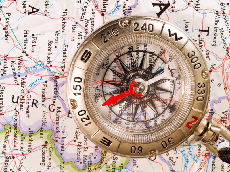 Compass on a map stock image. Image of isolated, road - 48815379