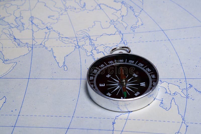 Compass on the map stock image. Image of exploration - 69859247