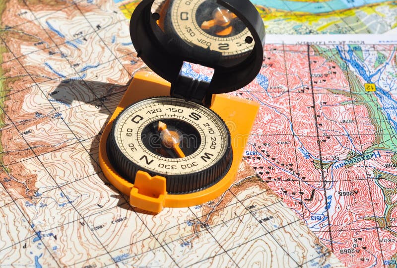 Compass and maps. stock photo. Image of area, compass - 42291644