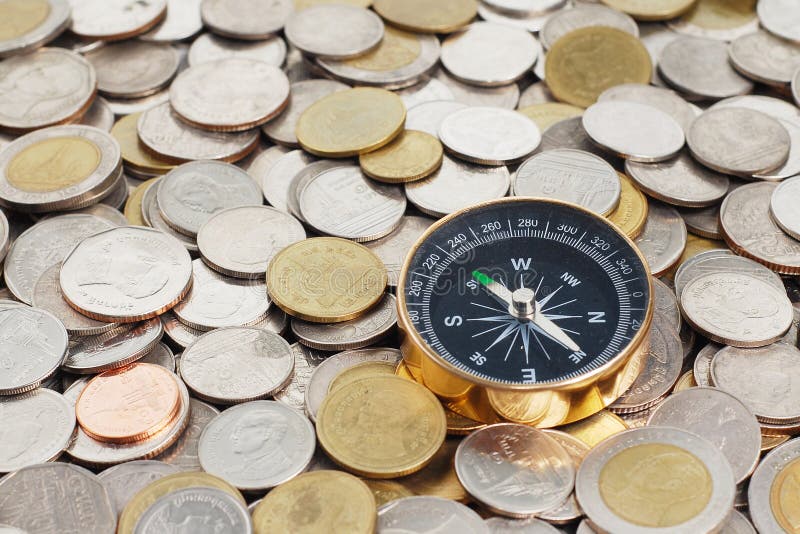 Compass and money stock photo. Image of compass, cent - 78209958