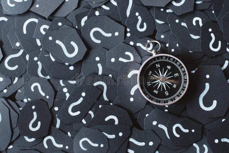 Compass with Moving Rod on Question Mark Background. Stock Photo ...