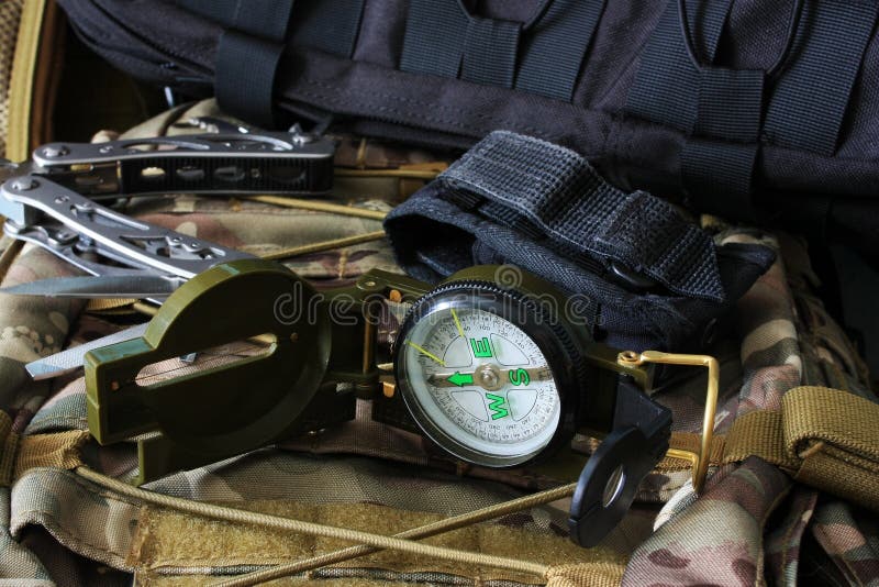Compass and Multitool are in the Backpack Stock Image - Image of ...