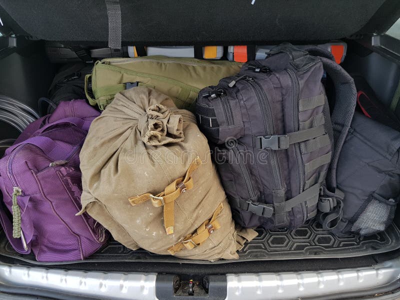 Backpacks and Bags in the Trunk of the Car Stock Image - Image of ...