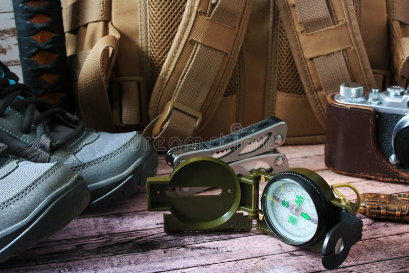 Compass, Multitool and Backpack for Hiking Stock Image - Image of city ...