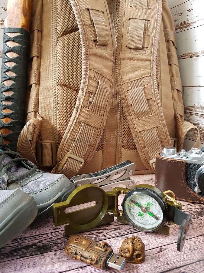 Compass, Multitool and Backpack for Hiking Stock Photo - Image of ...