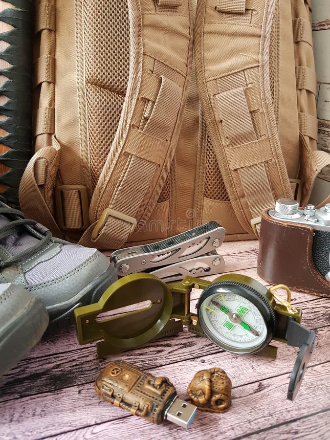 Compass, Multitool and Backpack for Hiking Stock Photo - Image of ...
