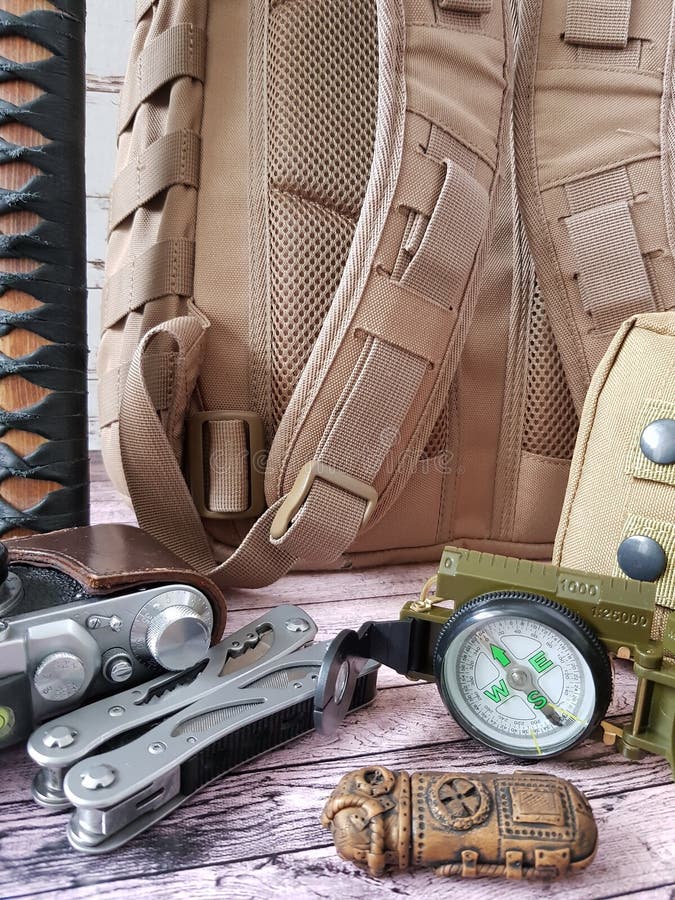 Compass, Multitool and Backpack for Hiking Stock Photo - Image of city ...